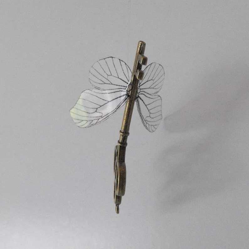 Flying Key With Small Reversed Butterfly Wings in Antique Brass ...
