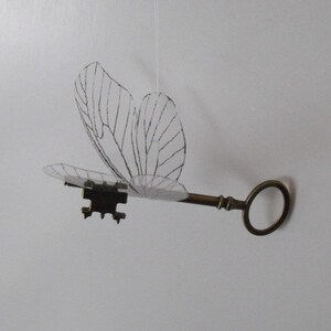 Flying Magical Key With Large Butterfly Wings in Antique Brass - ALOLBF ...