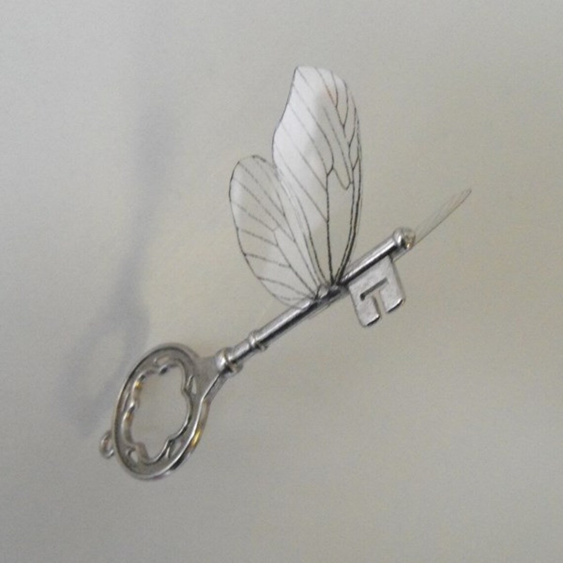Flying 'magical' Winged Key With Small Butterfly Wings in Shiny Silver ...