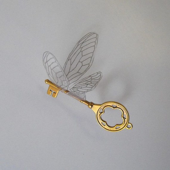 Flying winged key with large wings in shiny brass SRBLP | Etsy
