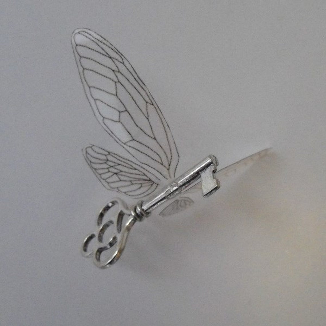Flying 'magical' Key With Large Wings in Shiny Silver - Etsy