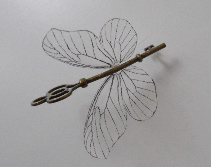 Winged Key With Large Reversed Wings in Antique Brass ALCTLBFRM - Etsy