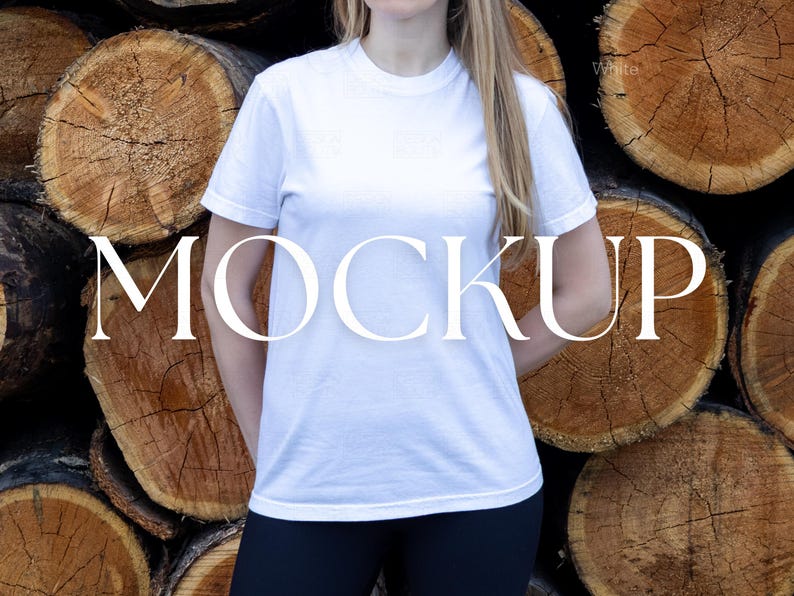 White Comfort Colors 1717 Mockup, Outdoor Wood Logs Background, Real ...