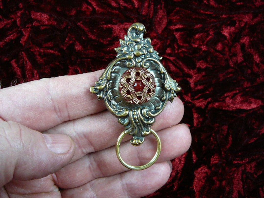 1940's Czech Red and Gold Starburst Swirl Button Flower Scrolled Brass Eyeglass Pin Pendant ID ...