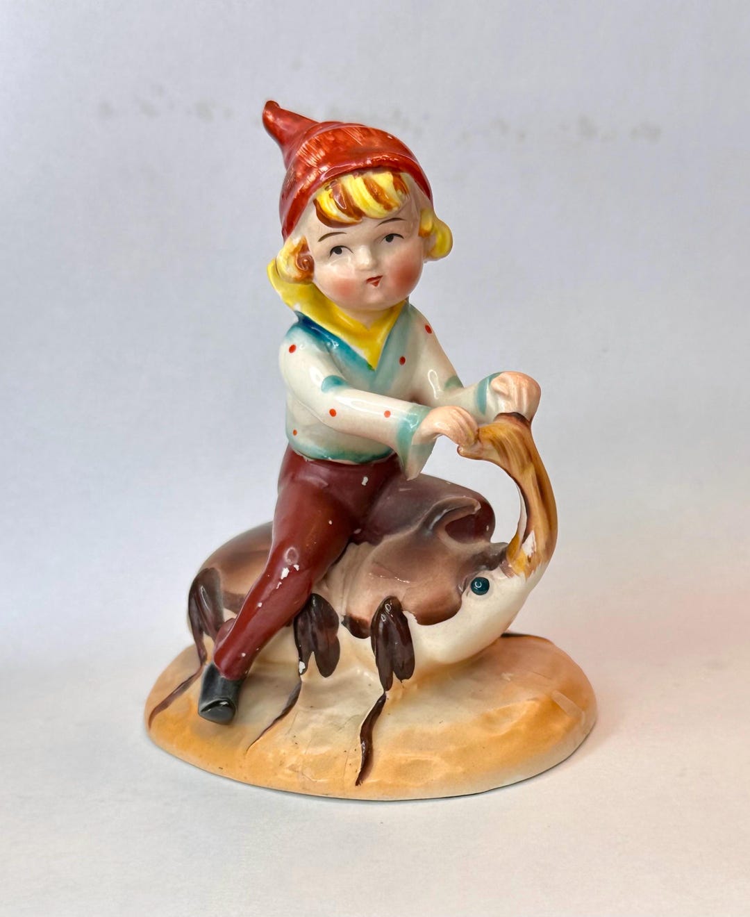 Mid-century Hand Painted Porcelain "elf Riding Rhino Beetle" Figurine ...