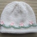 Knitting Pattern 110 White Hat With Pink Flowers for a Girl in Sizes 6 ...