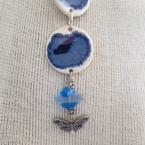 Sea Glass Pendant With Ceramic Discs and Cute Butterfly by Styx - Etsy