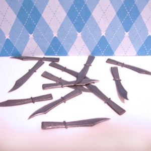 25 Mini Gray Plastic Pirate Swords Charms - Etsy