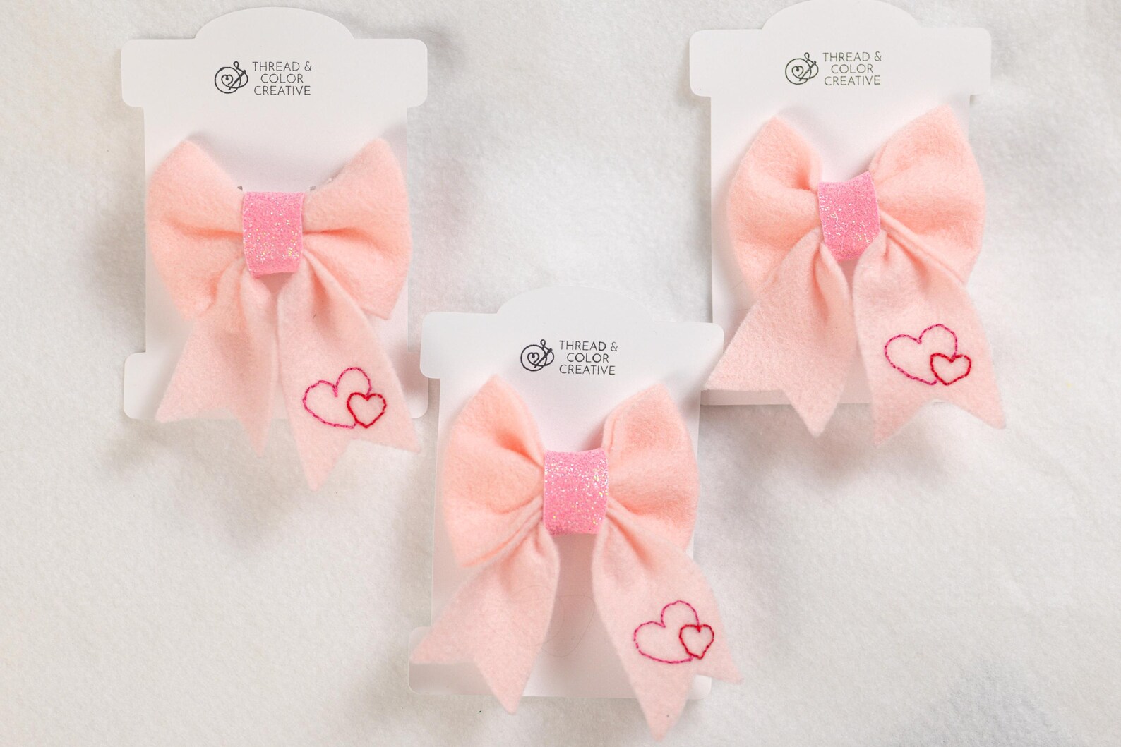 Light Pink Felt Bow With Pink Sparkly Center and Nested Red and Pink ...