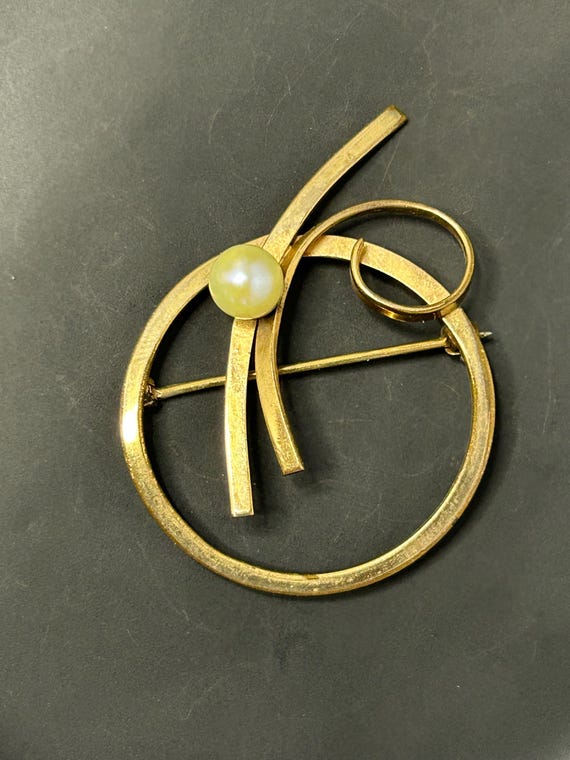 Vintage gold tone circle - Gem