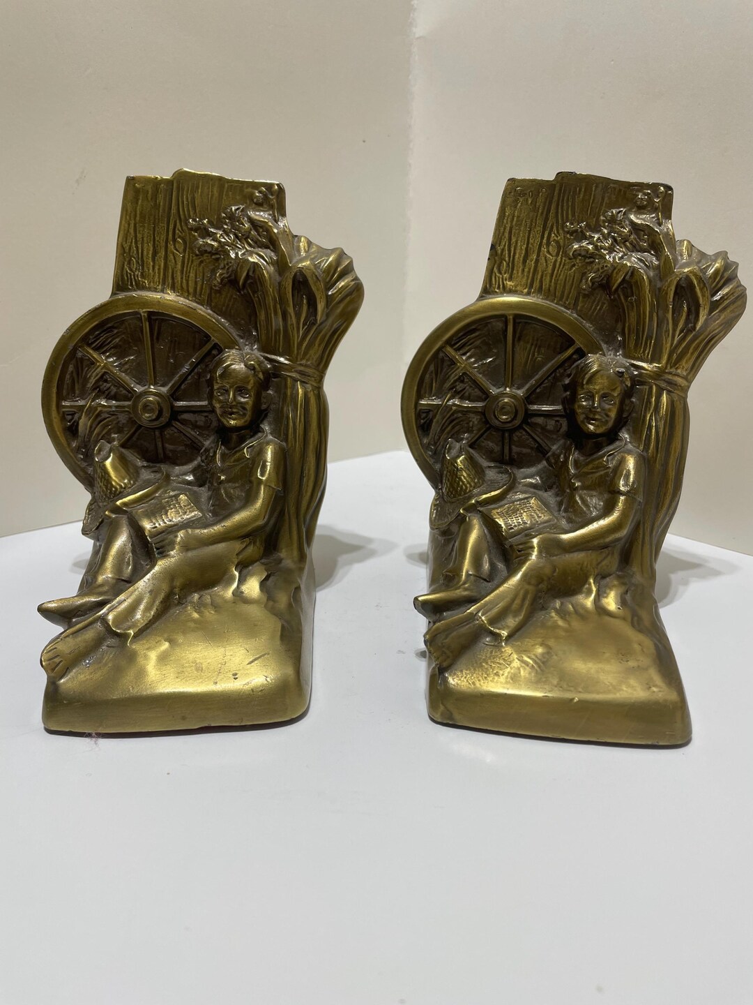 Vintage Brass Bookends – P.M. Craftsman Farm Boy Reading by Wagon Wheel ...