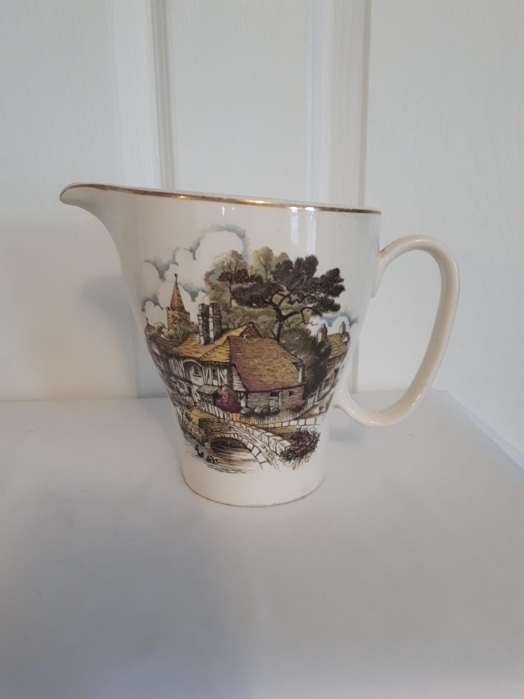 Mid Century Milk Pitcher by Falcon Ware - Etsy