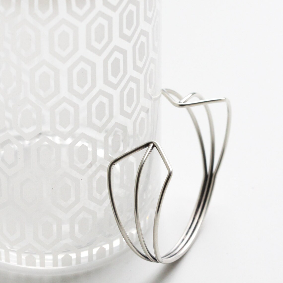 Geometric bracelet designed with angles and lines its open | Etsy