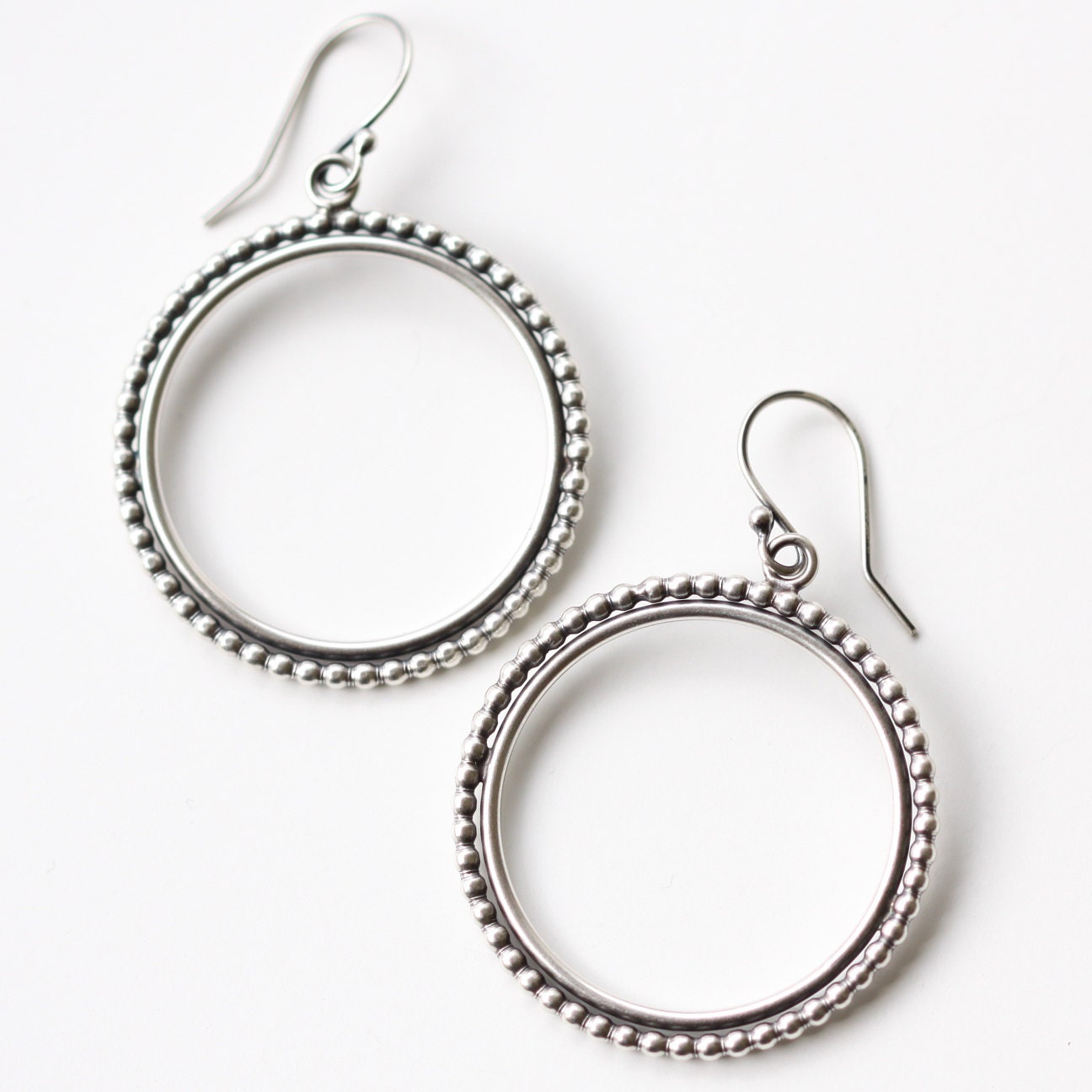 Modern silver hoops striking and edgy design of two circles | Etsy
