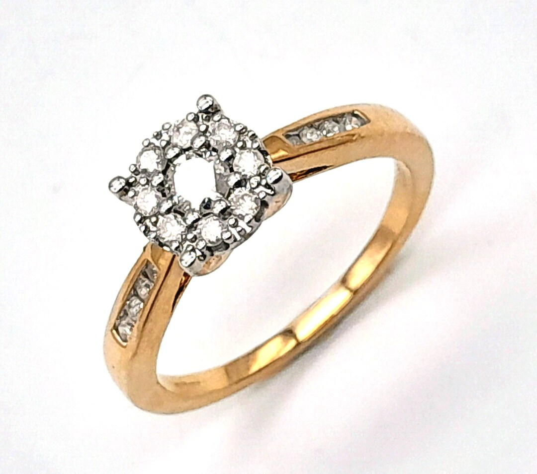 A 9K Yellow Gold Diamond Set Ring 0.32CT. 2.6G in Weight. (size M ...