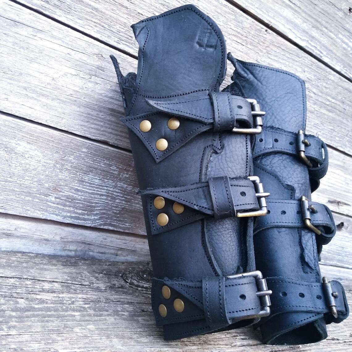 Oiled Black Leather Bracers: Ethiopian Brass Shield Accent - Etsy