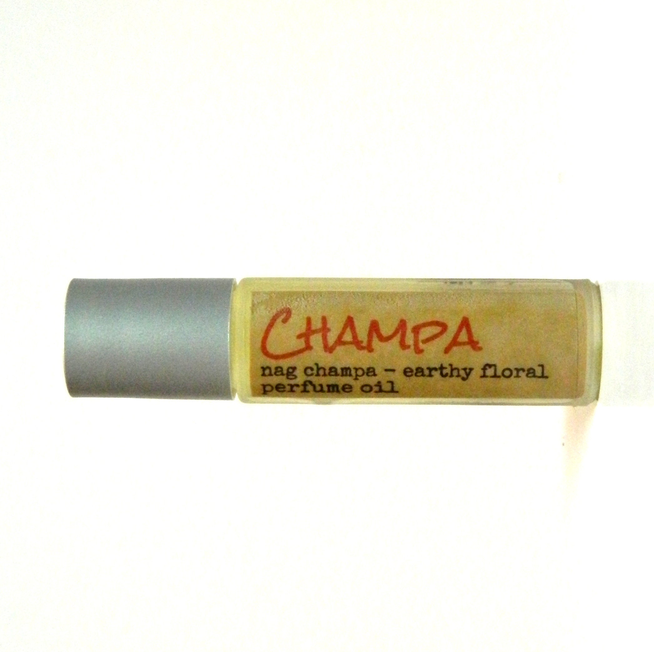 NAG CHAMPA Perfume Oil / Earthy Floral Roll on Fragrance Oil / | Etsy