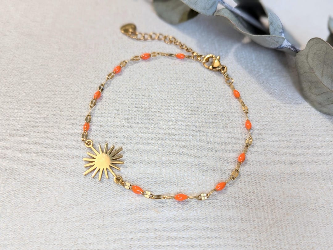 Solaris Bracelet in Gold-tone Stainless Steel With Sun Charm and Orange ...