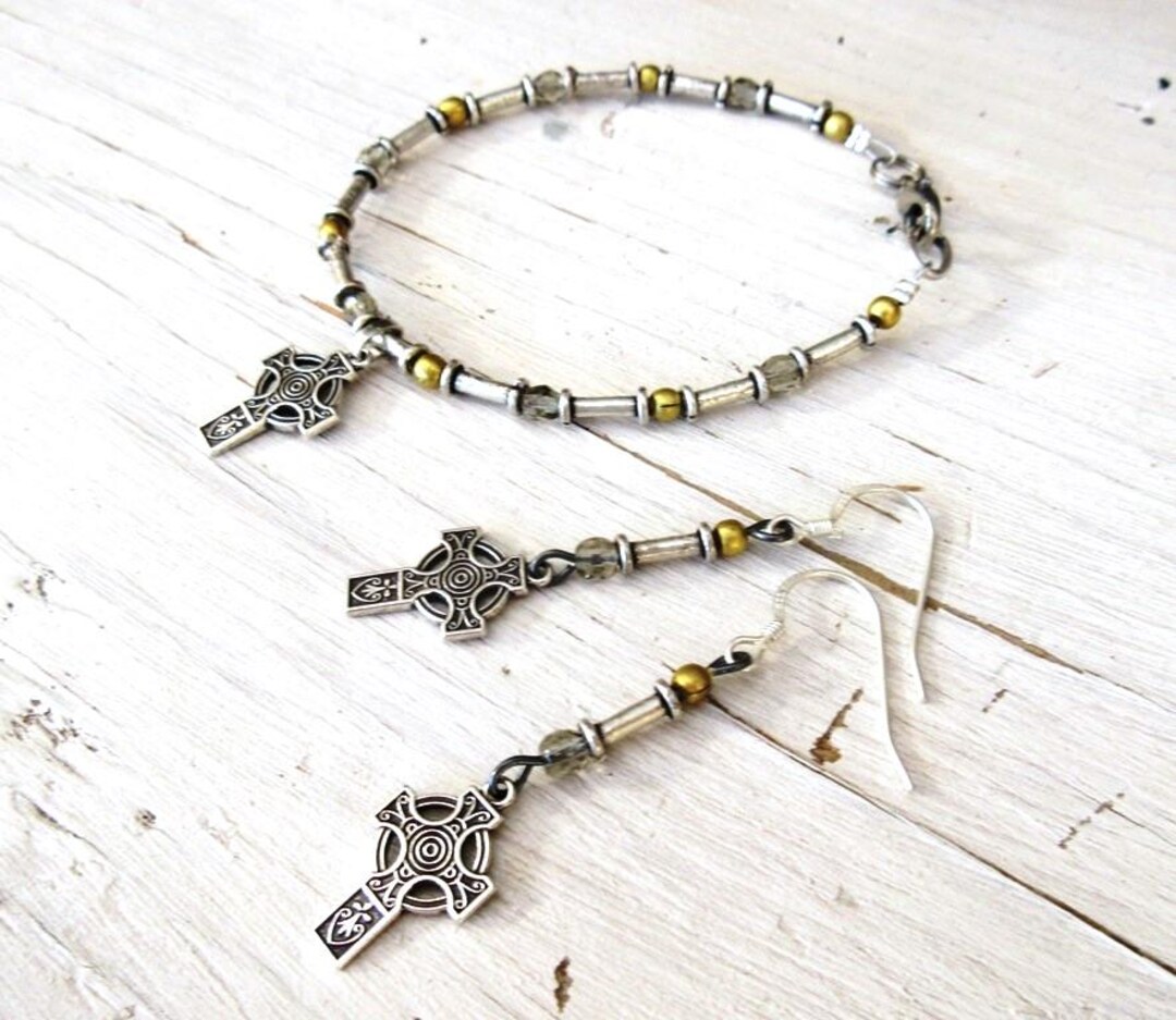 A Minimalist Set of Bracelets and Earrings With Small Crosses in Silver ...
