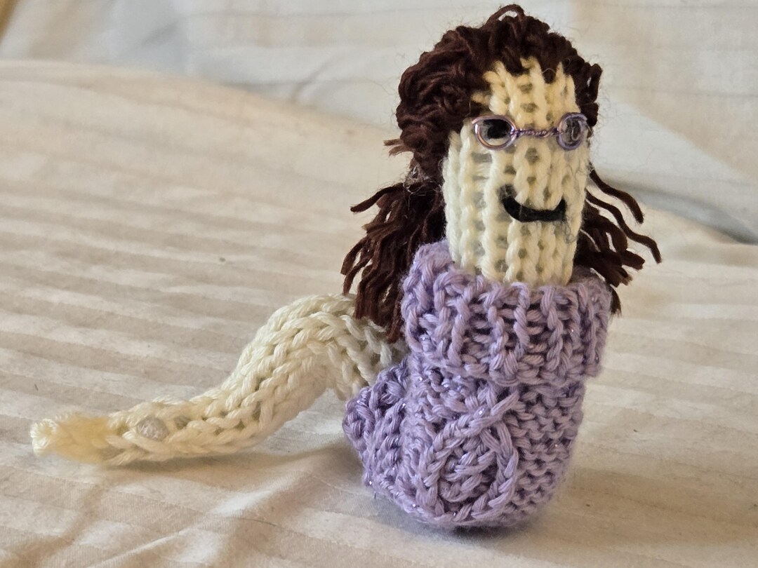 Cute Knitted Bookworm in a Sweater With an Oval Cable, Glasses, and a ...