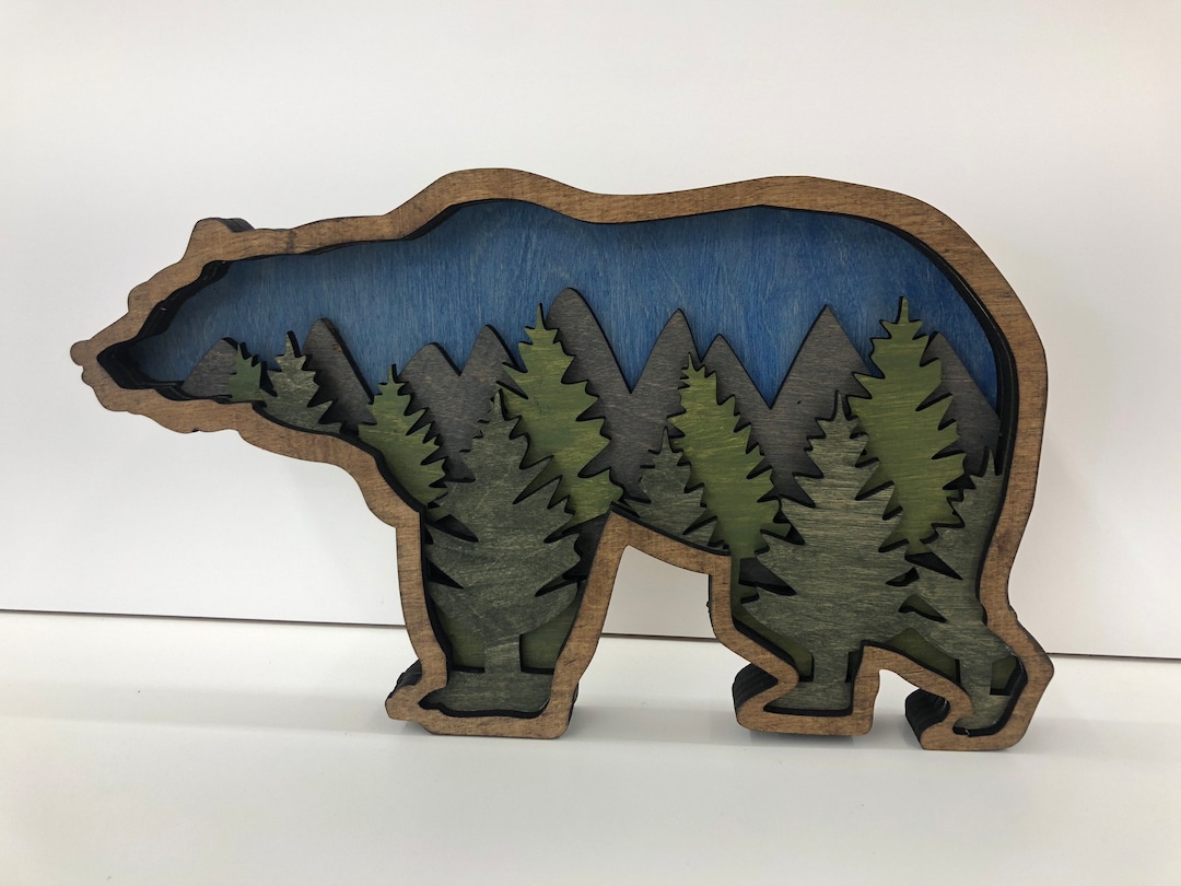 3D Stained Wood Bear Scene Mountains and Layered Trees Nested in a ...