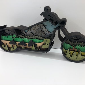 3D Stained Wood Motorcycle Scene With Mountains & Trees Nested in a ...