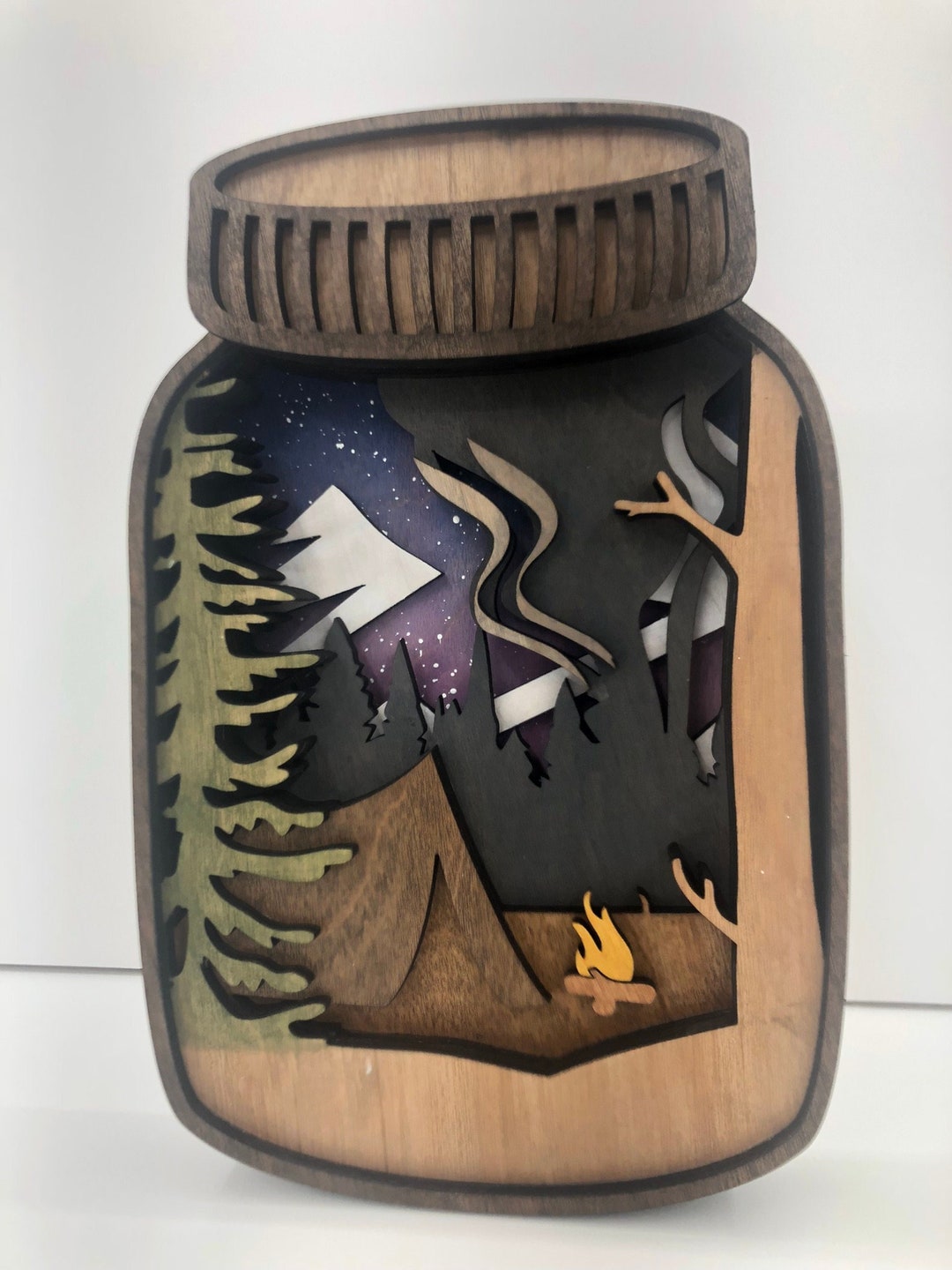 3D Stained Wood Jar Scene With Trees, Mountain and Camping Nested in a ...