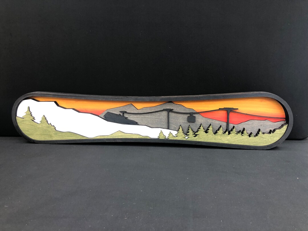 3D Stained Wood Snowboard Mountain Scene With Snowboarder and Ski Lift ...
