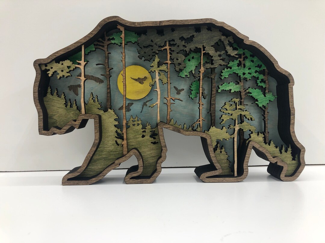 3D Stained Wood Bear Scene With Layered Trees and Birds Nested in a ...