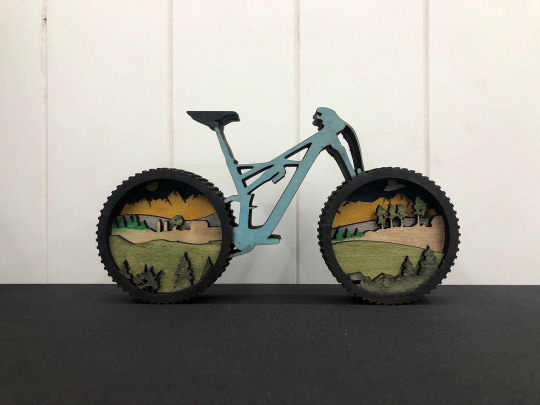 3D Stained Wood Mountain Bike Scene With Mountain, Trees and Bikers ...