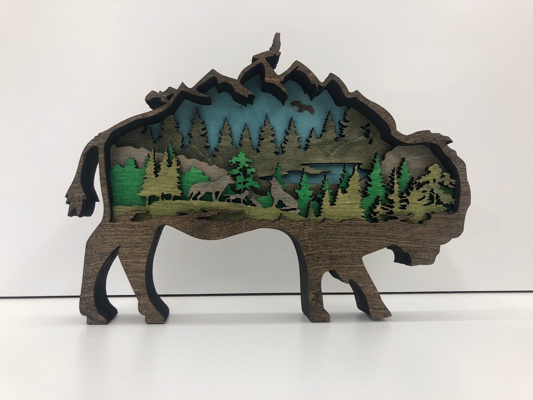 3D Stained Wood Bison Scene Mountains, Trees and Wolves Nested in a ...