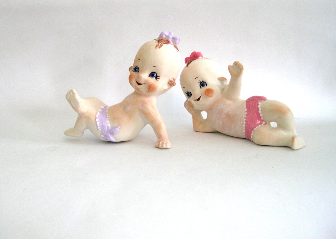 Charming Piano Babies Dressed in Diapers, and Cast in Porcelain From a ...