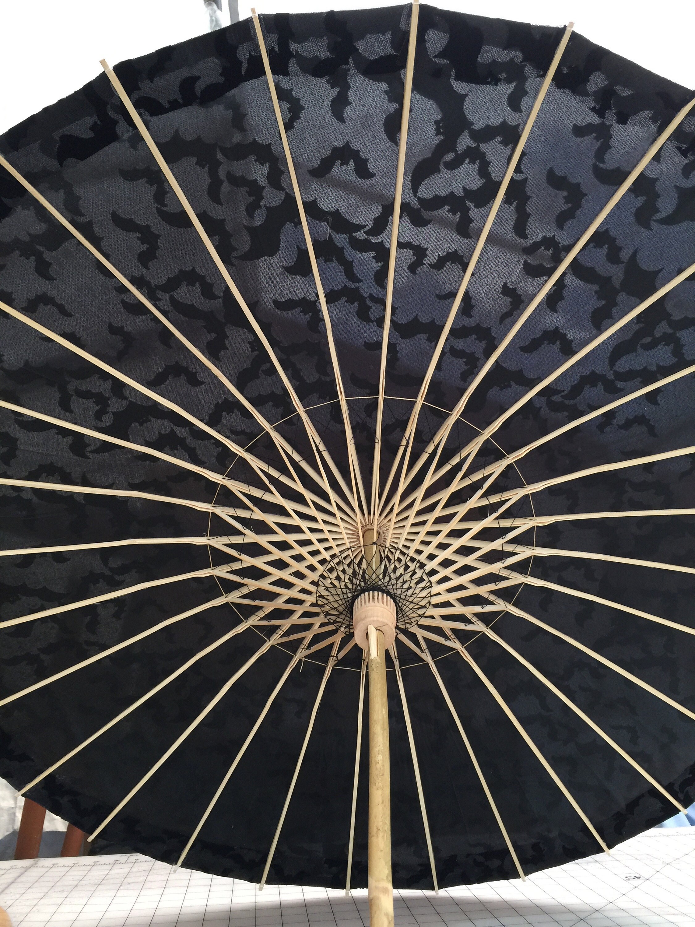 Black parasol with Black bats
