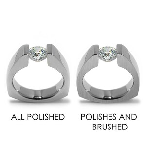 PYRAMID Triangular Shaped Ring With a Tension Set White Sapphire in ...
