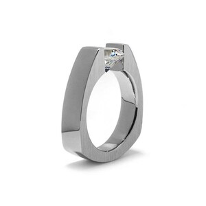PYRAMID Triangular Shaped Ring With a Tension Set White Sapphire in ...