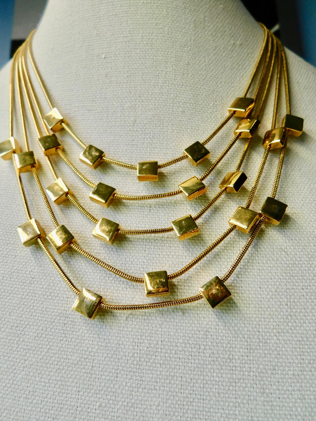 DVF Gold Tone 5 Snake Chain Strands With Metal Squares Necklace. Diane ...