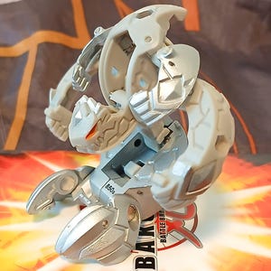 Bakugan Haos Vertexx 850g Mechtanium Surge Spin Master Rare - FREE ...
