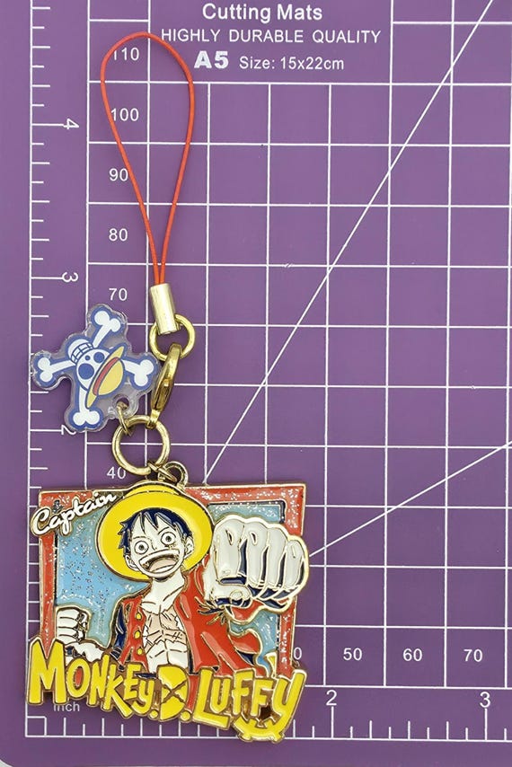 One Piece-inspired Monkey D. Luffy keychain accessory… - Gem