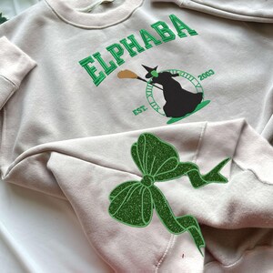 Elphaba Glinda Side Bow Embroidered Sweatshirt, Wicked Musical Movie ...