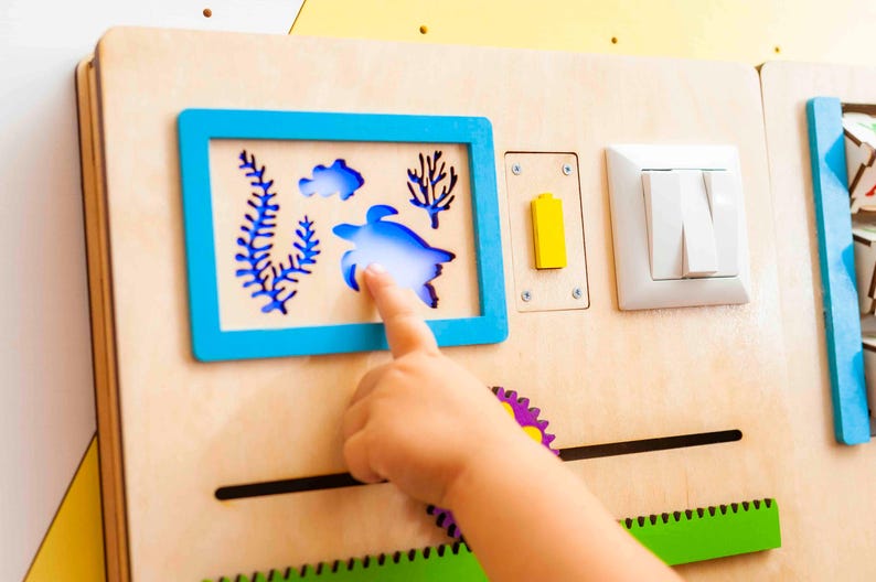Activity Wall With Lightening Aquarium in Bright Color. Wall Mounted ...
