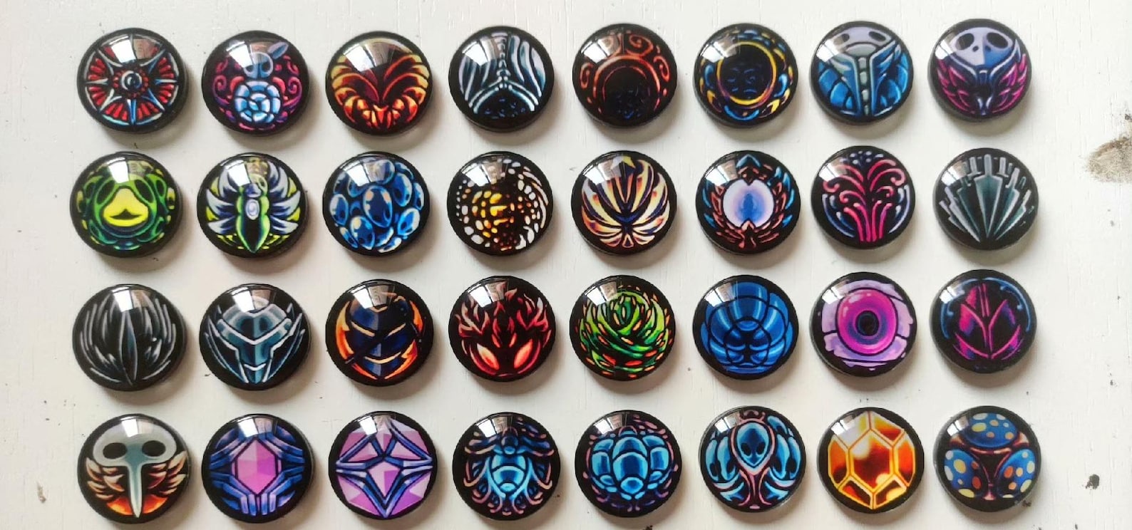 Colección enmarcada de los 42 amuletos de Hollow Knight - Imanes para ...
