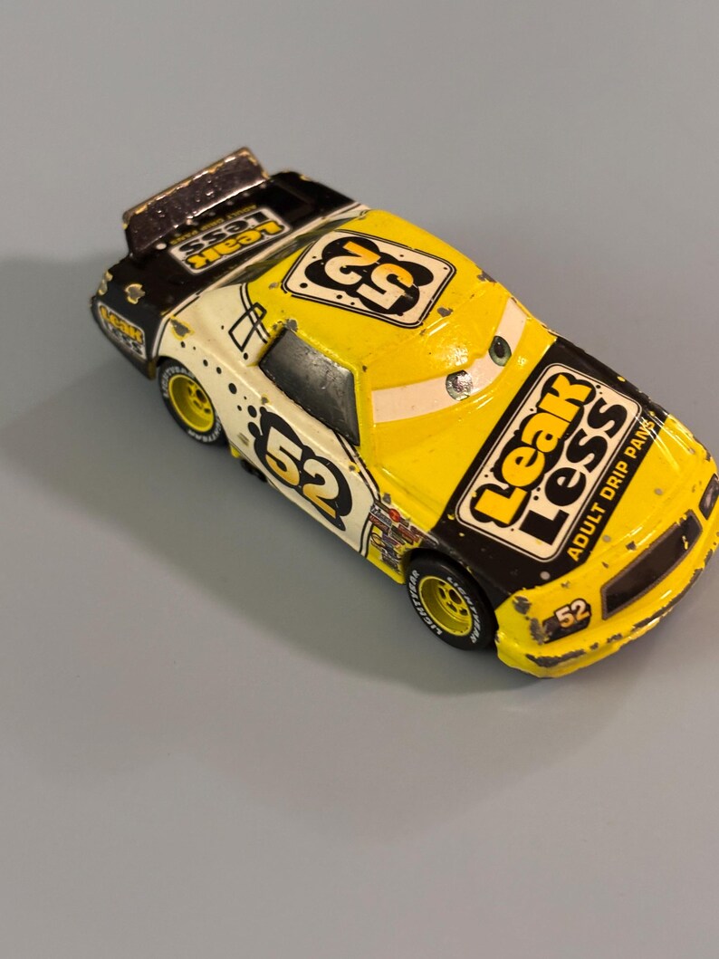 Disney Pixar Cars Claude Scruggs #52 Leak Less Yellow Die-cast Vehicle ...