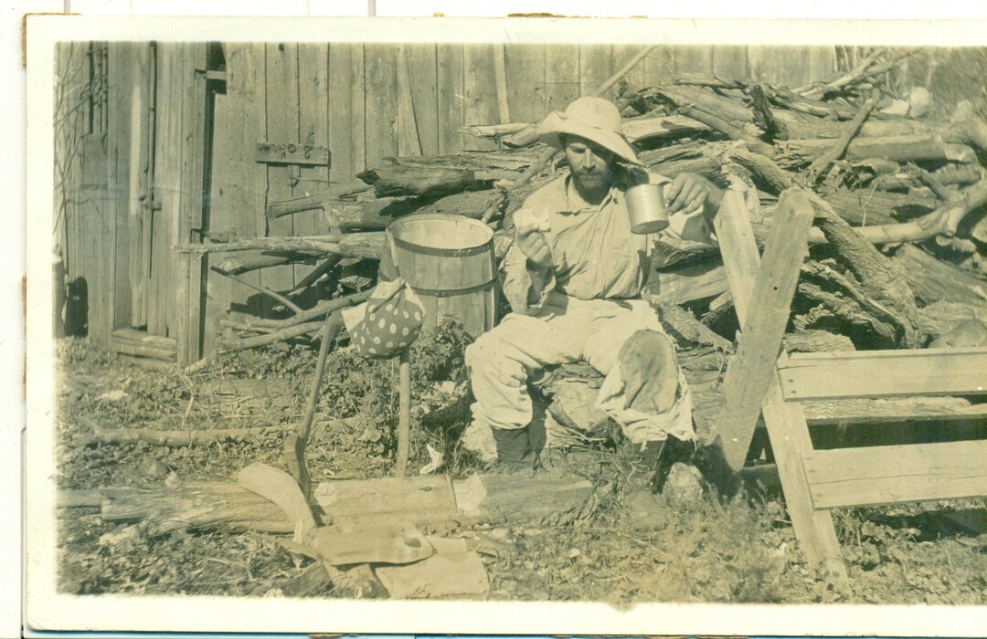 The Hobo Man Sitting Eating Bread Drink Tin Cup Torn Pants Novelty ...