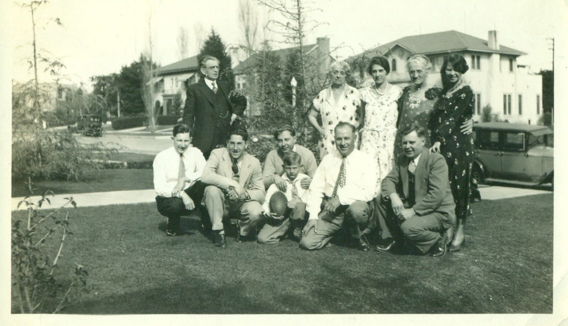 1940s Thanksgiving Boy Holding Football Family Group Outside 40s ...