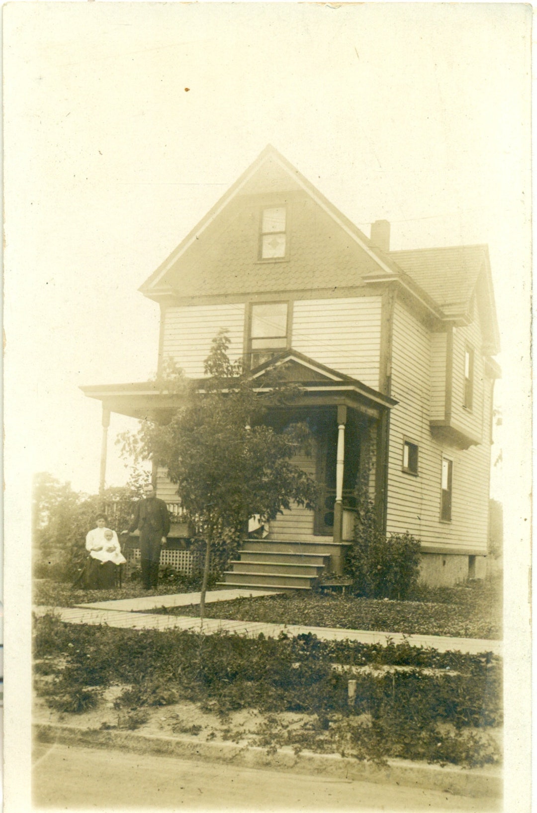Midwestern Family in Front of House Baby on Mothers Lap 1900s RPPC Real ...