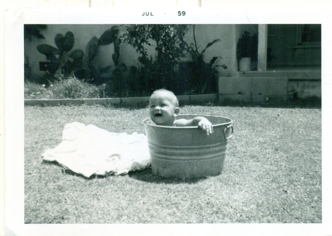 1959 Baby in A Metal Bucket Wash Bin Outside Summer Vintage Black White ...