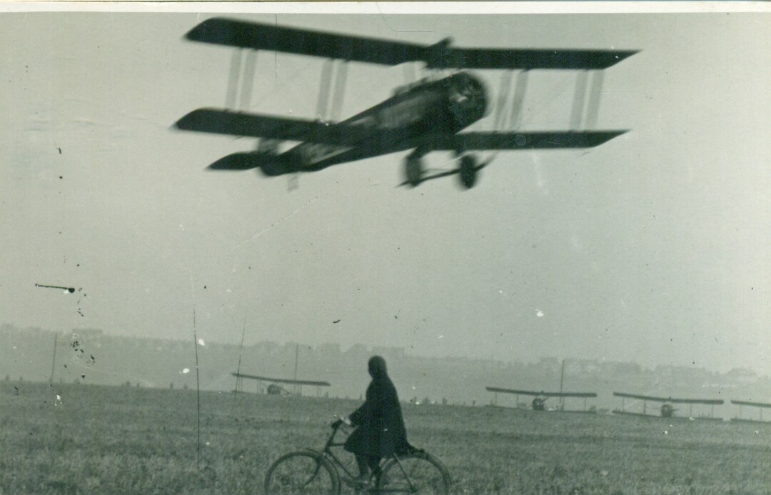 Riding a Bicycle Under a Bi Wing Aeroplane Airplane Plane Photo - Etsy