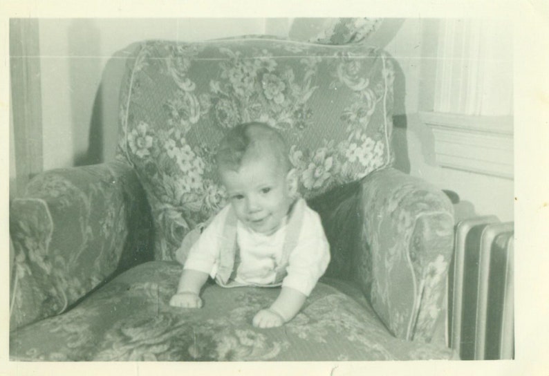 Coy Baby Crawling on Oversized Chair Curly Hair Smile Vintage Black ...