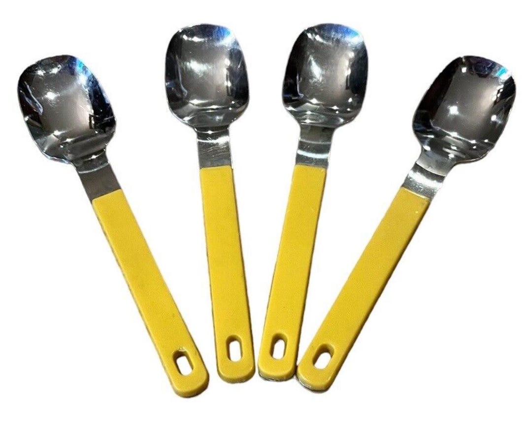 4 Vintage Swedish Rostfritt Stal Yellow Spoons 5" Long MCM . Holes for ...