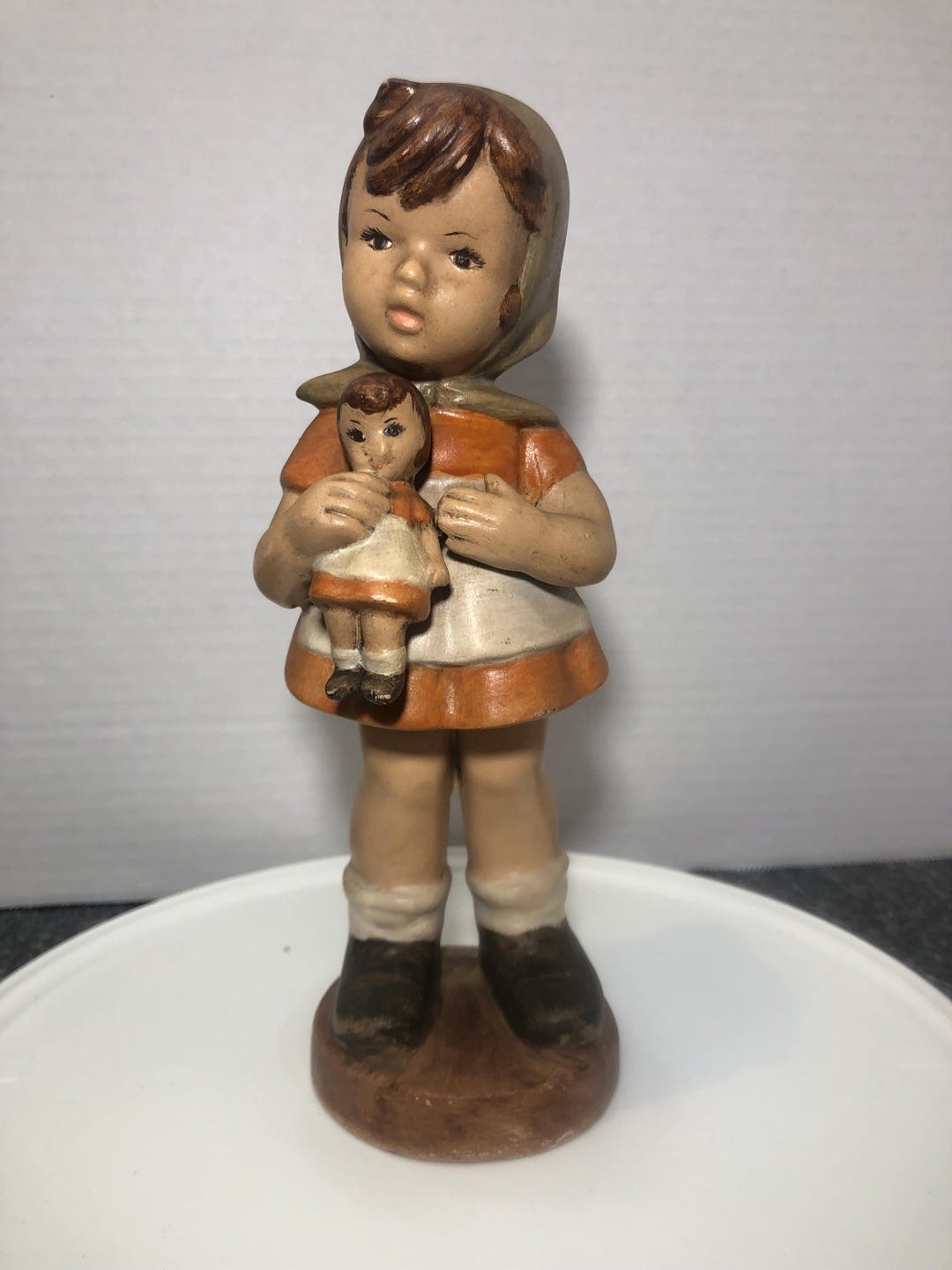 Vintage Little Girl Wearing Bonnet Holding Baby Doll Looks Like Goebel ...